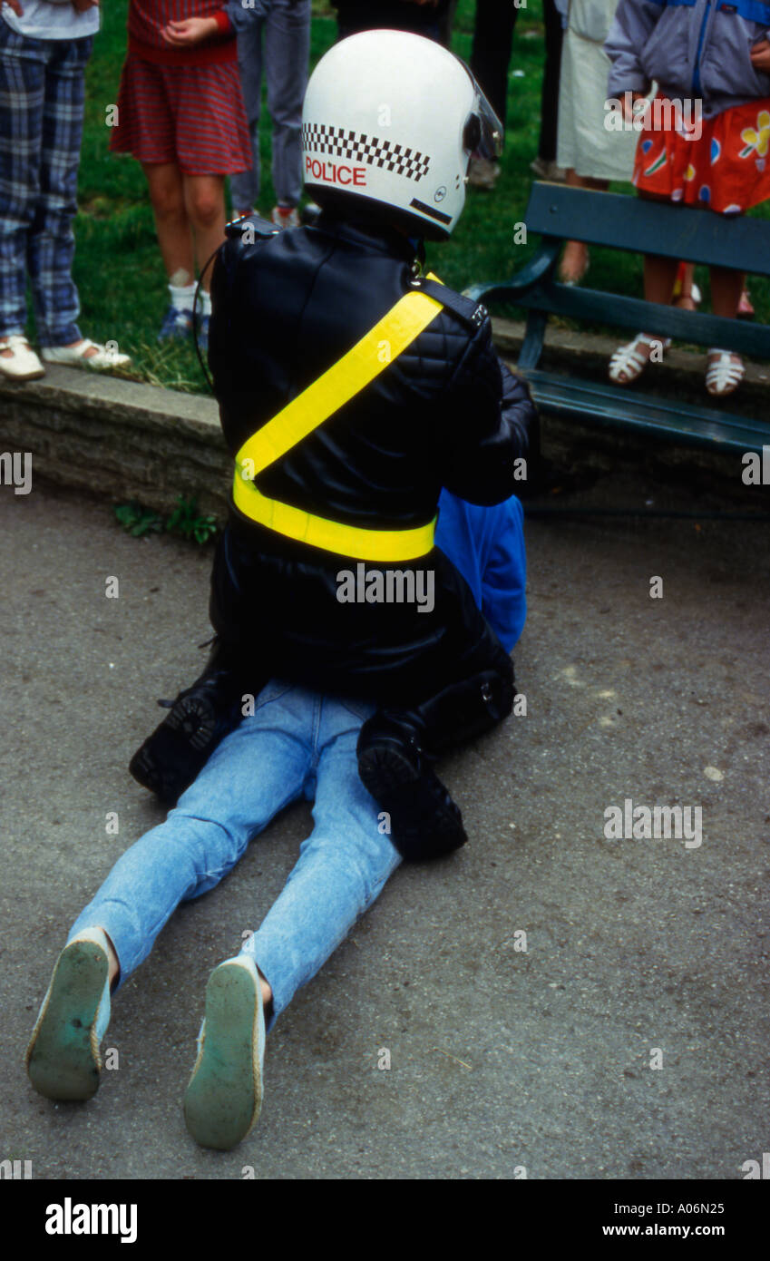 Motorcycle Police Officer apprehends a male teenager United Kingdom ...