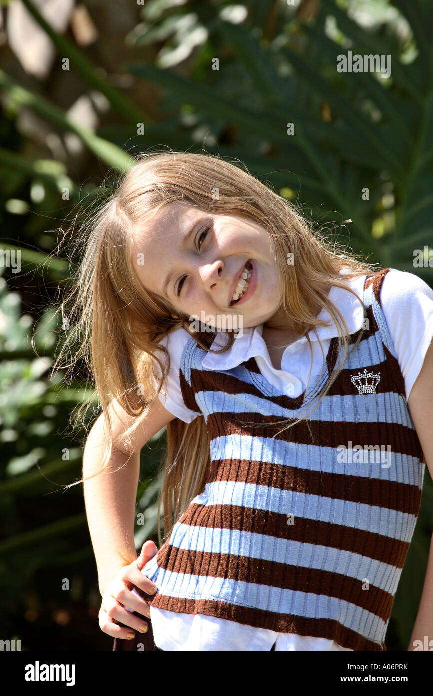 A pretty girl with head on shoulder Stock Photo - Alamy