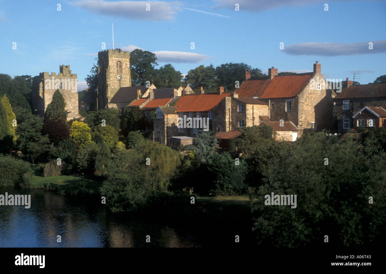 A view of West Tanfield village looking across the River Ure in North ...