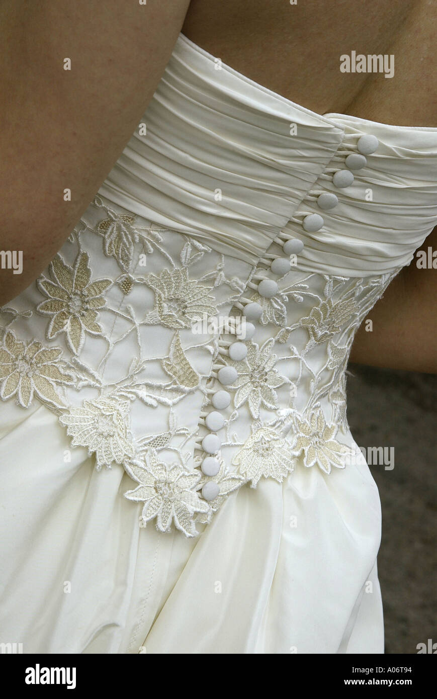 Back of brides wedding dress at uk wedding Stock Photo - Alamy
