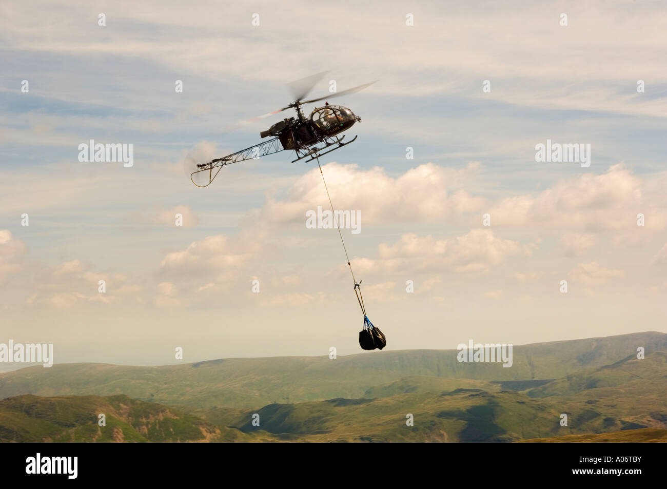 Sud Aviation Aerospatiale SA315B Lama helicopter carrying stone for ...