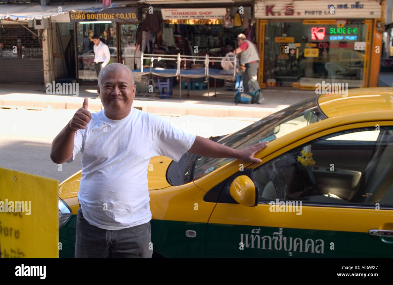 Friendly taxi driver giving thumbs up sign. Khao San Road, Bangkok ...