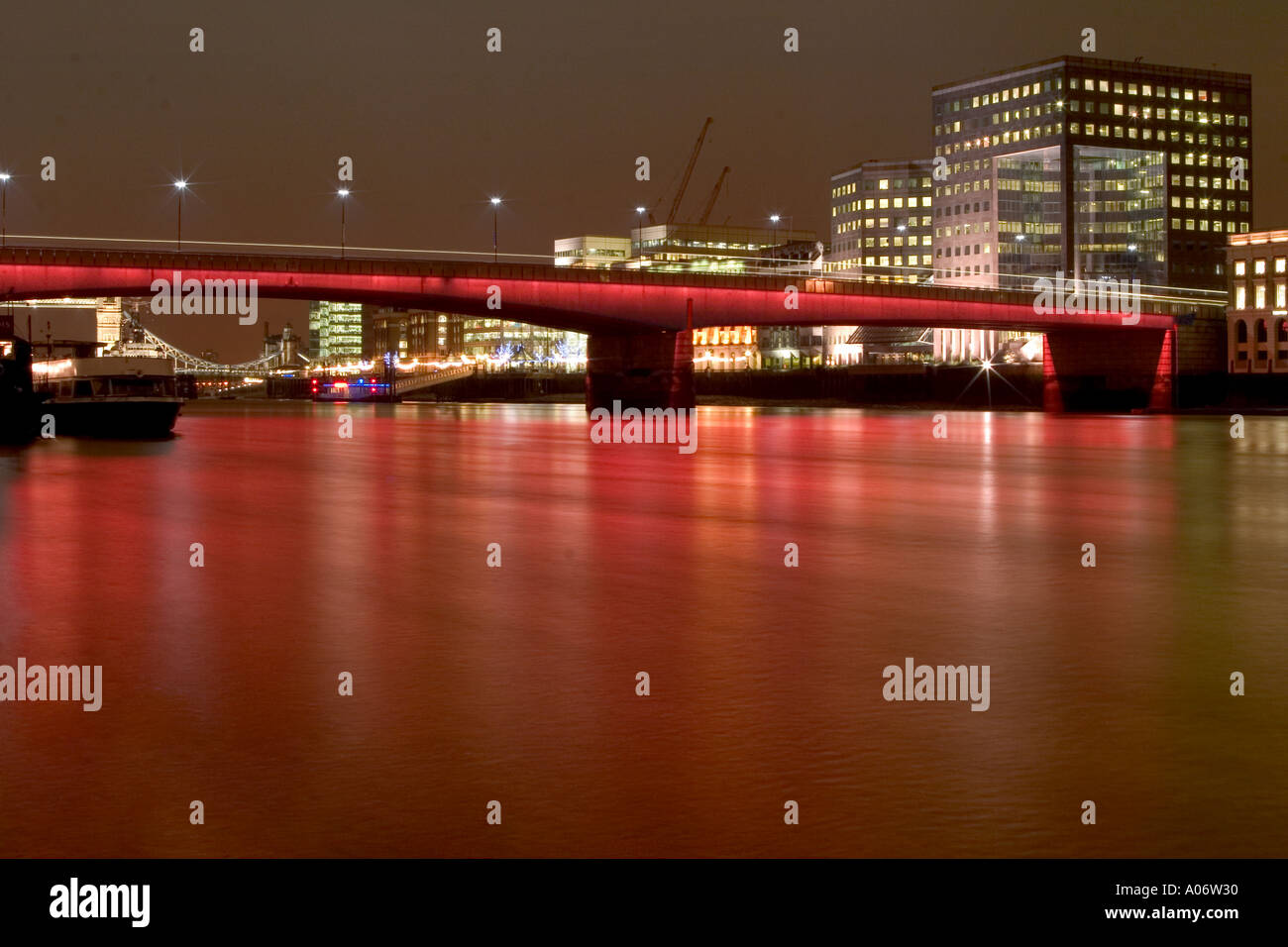 London Bridge at night from Thames foreshore. London, England Stock ...