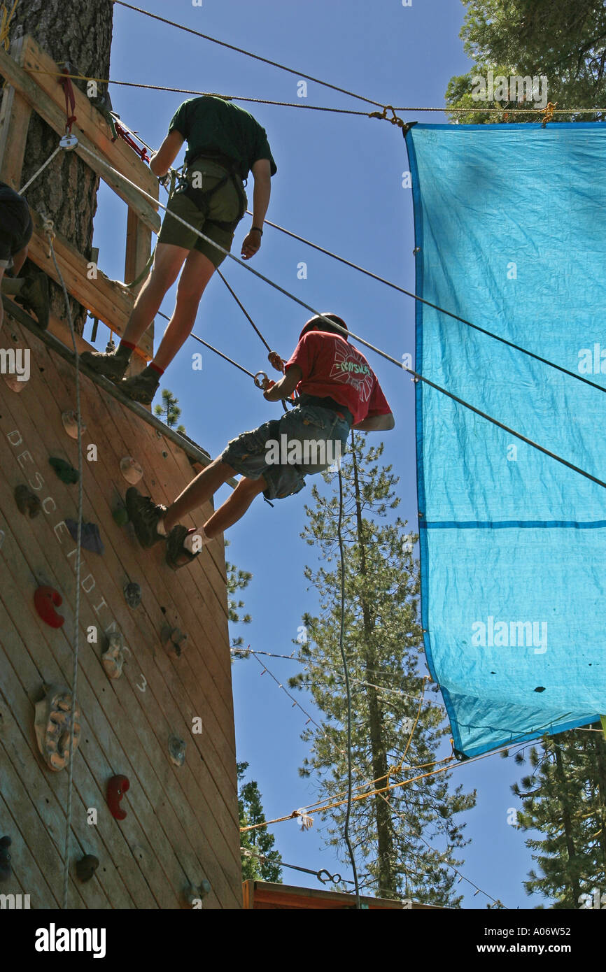 The boys are learning to do rock and elevation climbing Stock Photo - Alamy