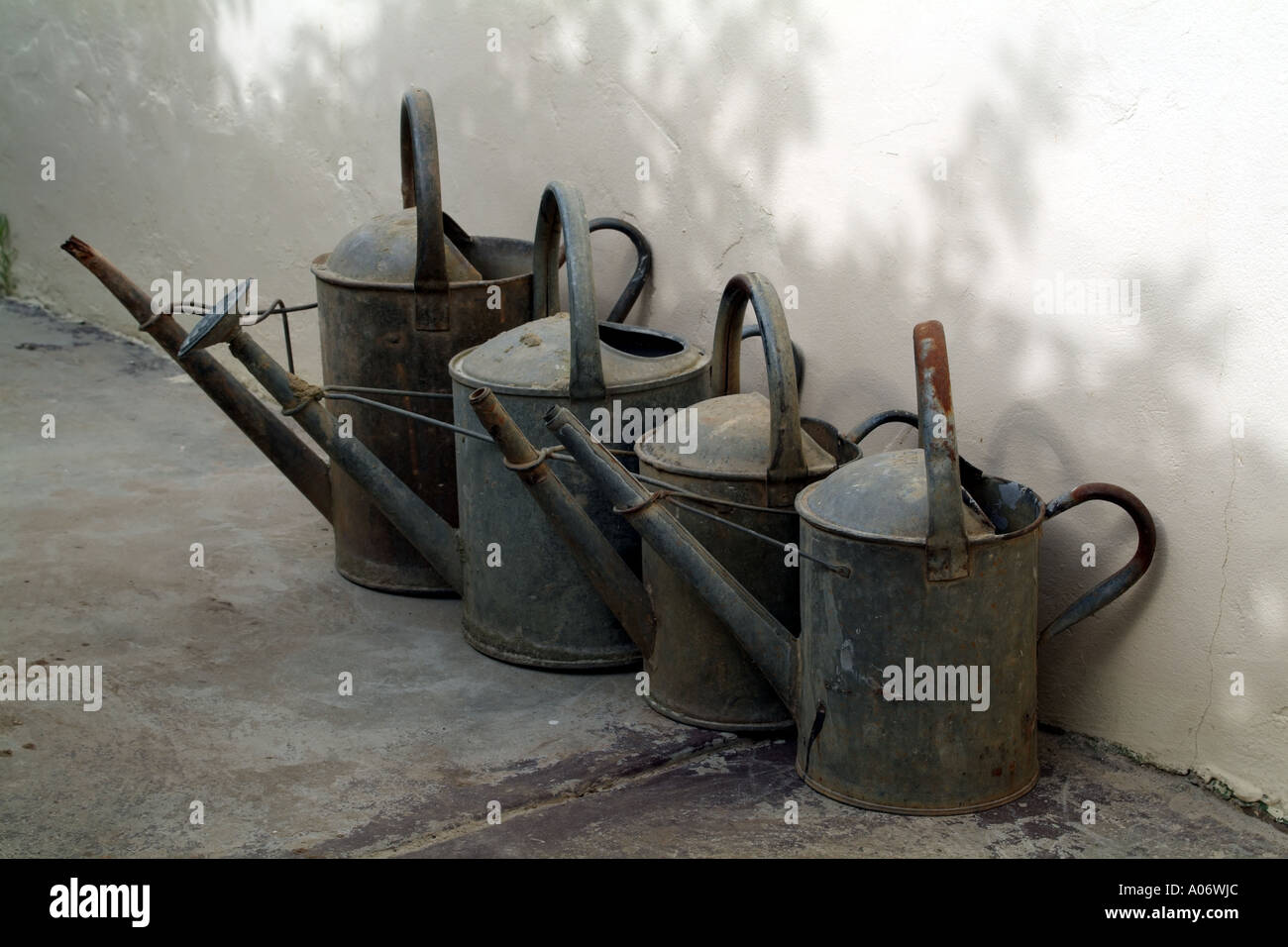 Watering Cans In A Row High Resolution Stock Photography and Images - Alamy