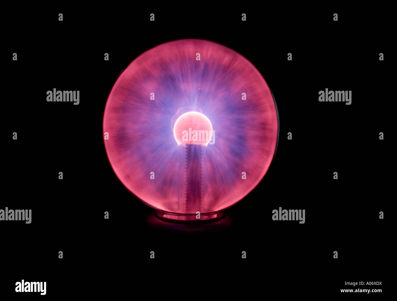 Full view of operating plasma globe against black background Stock ...
