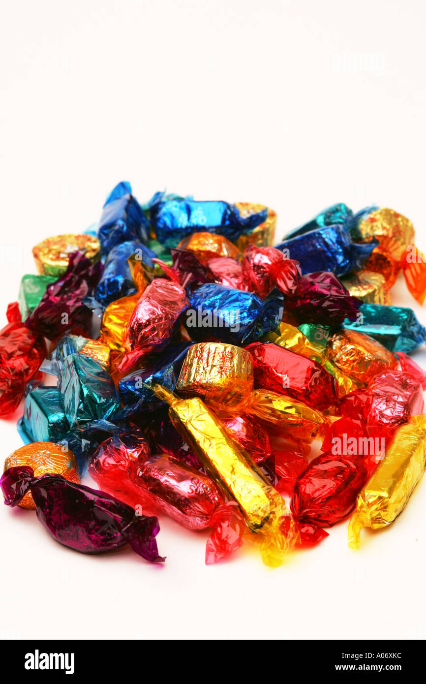 Assorted seasonal festive colourful chocolates sweets candy with shiny ...