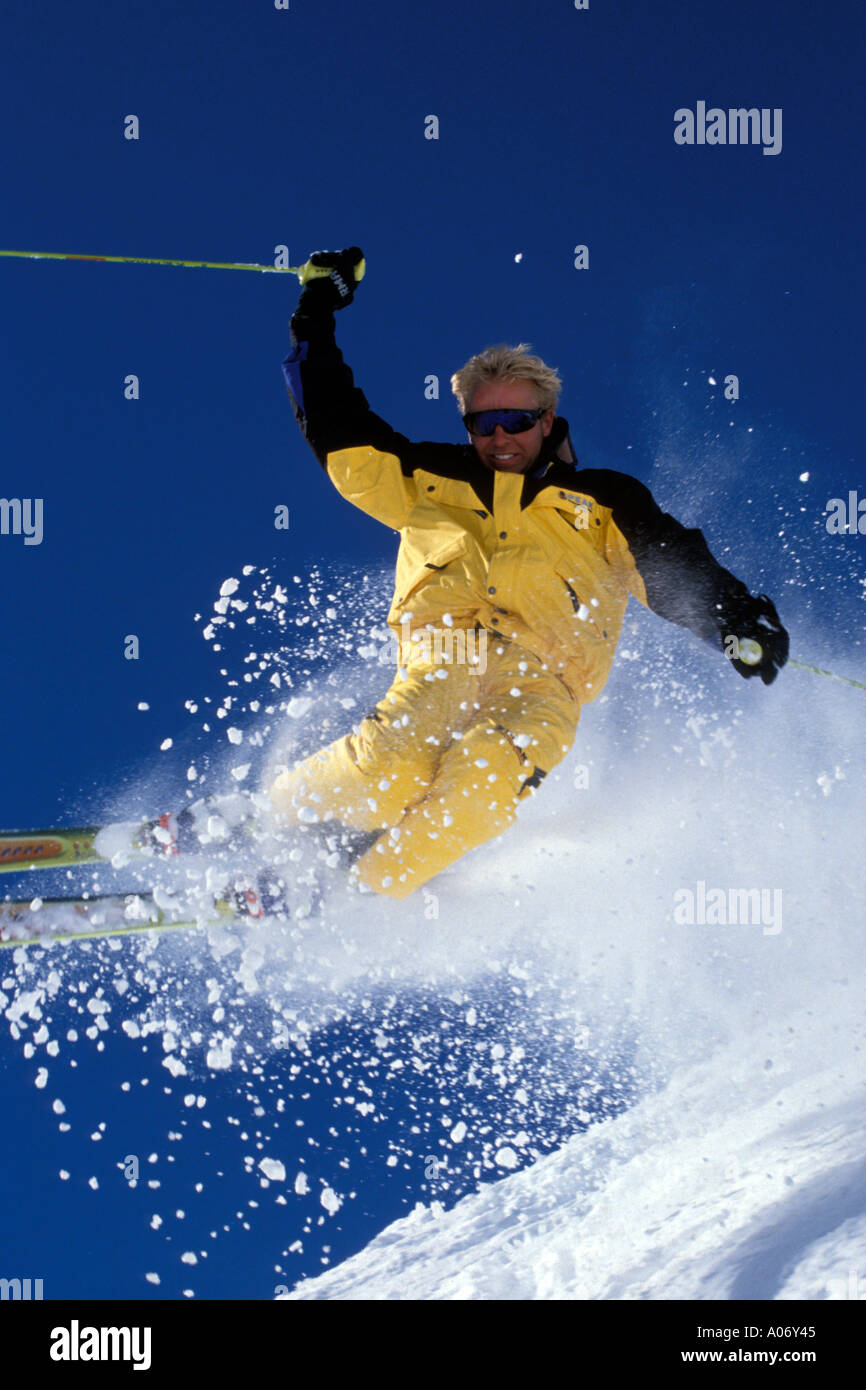 Yellow ski suit hi-res stock photography and images - Alamy
