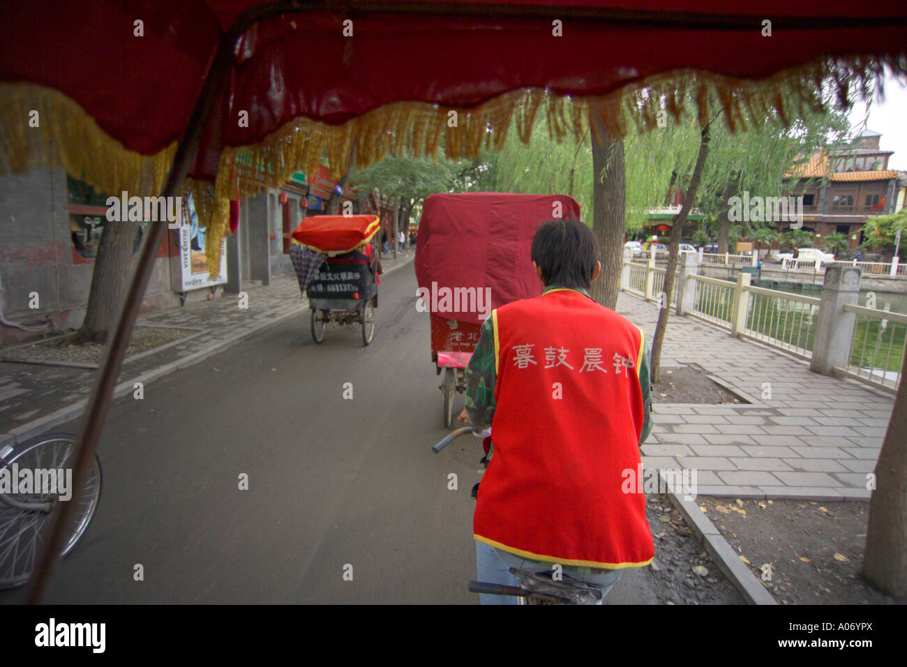 Rickshaw ride hutongs hi-res stock photography and images - Alamy