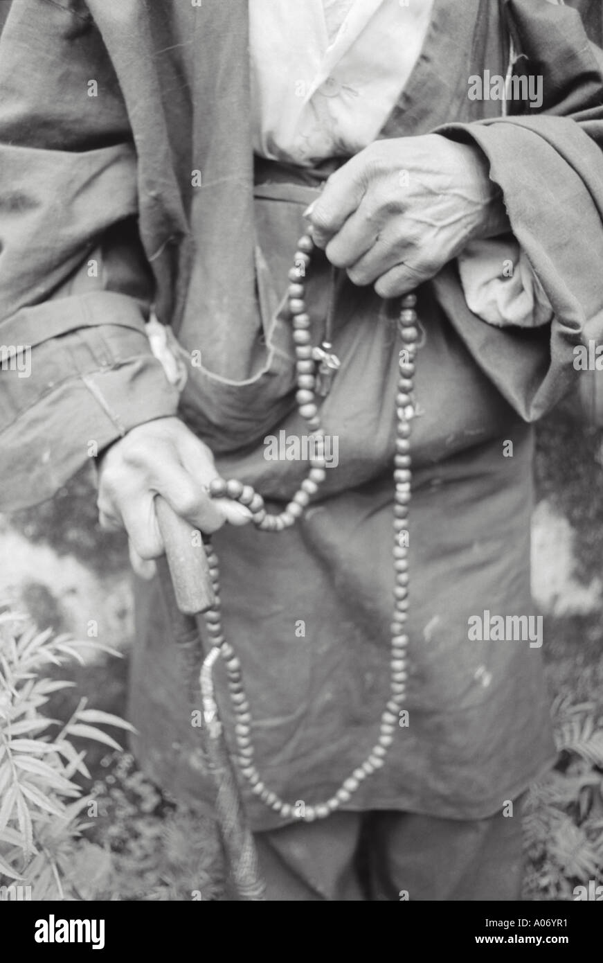 Buddhist man chanting on beads Darjeeling West Bengal India Stock Photo ...