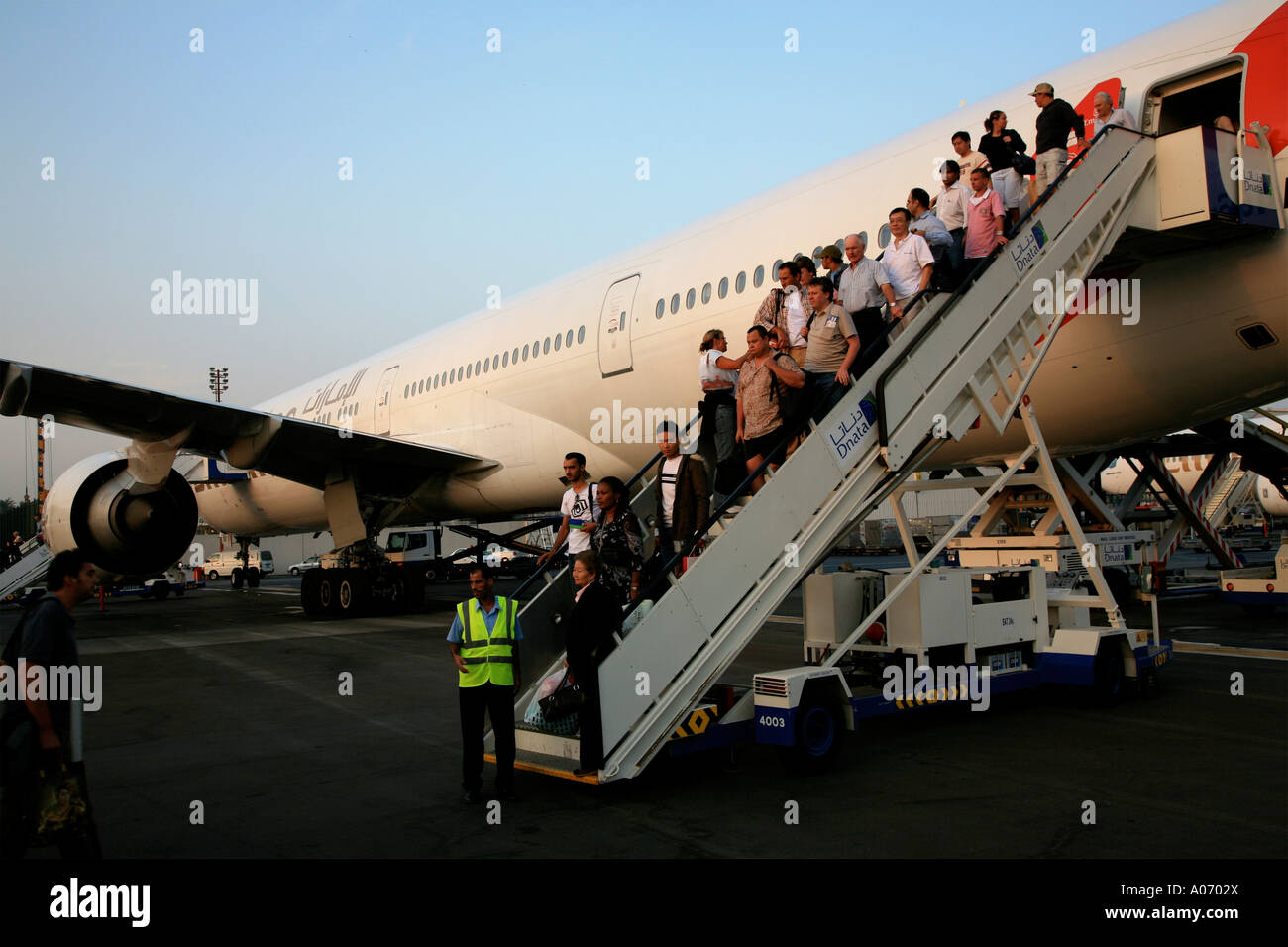 Disembarking plane hi-res stock photography and images - Alamy