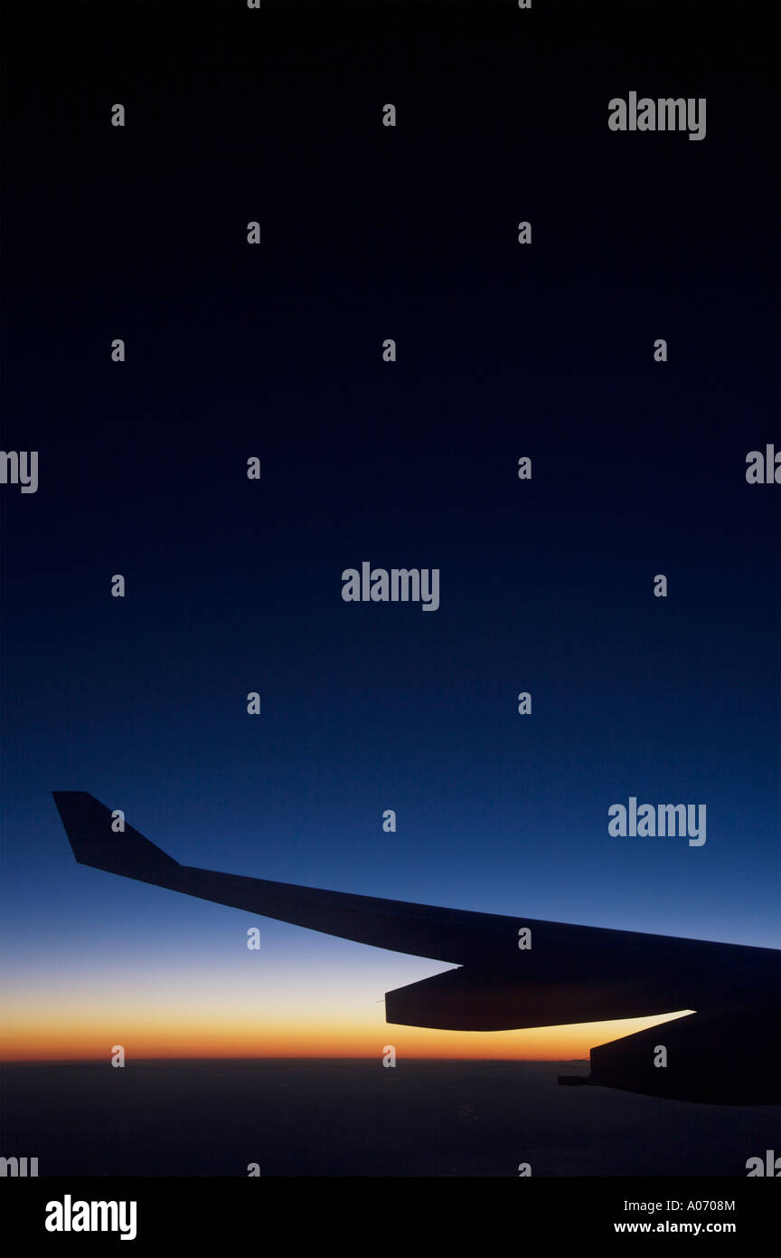 dramatic sunset sky from airplane window in flight Stock Photo - Alamy