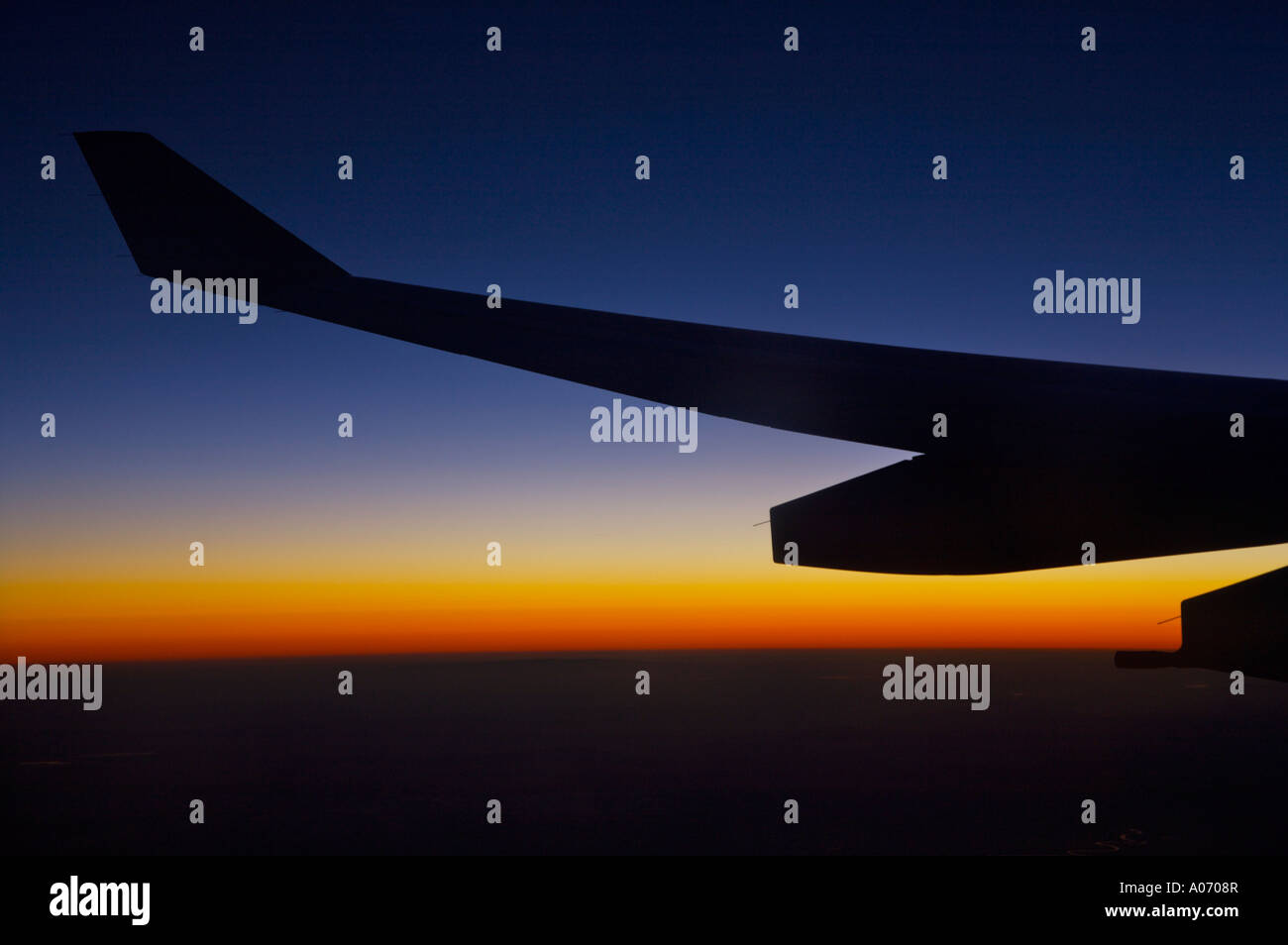 dramatic sunset sky from airplane window in flight Stock Photo - Alamy