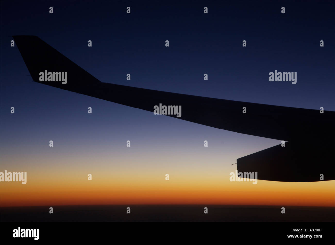 dramatic sunset sky from airplane window in flight Stock Photo - Alamy