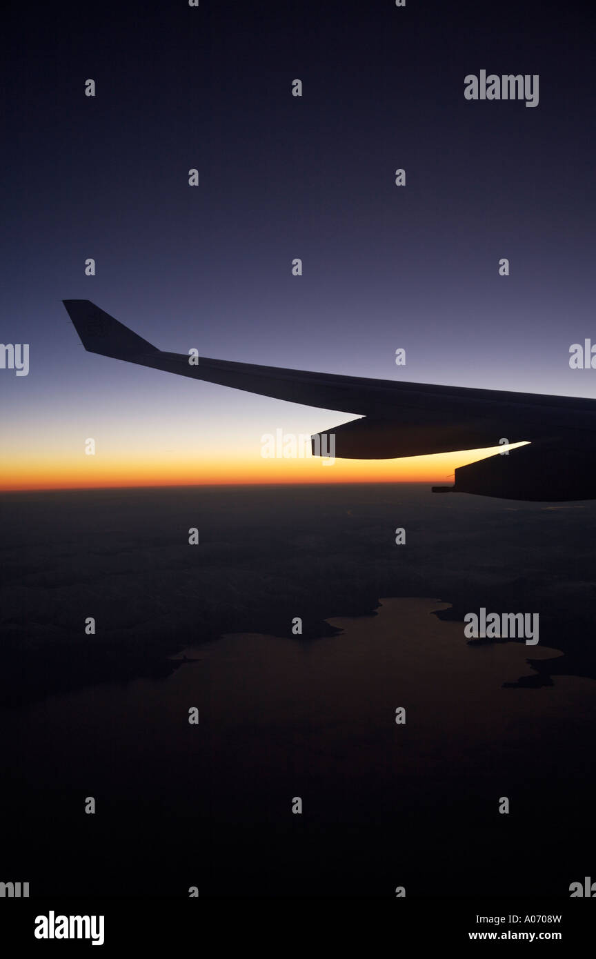 dramatic sunset sky from airplane window in flight Stock Photo - Alamy
