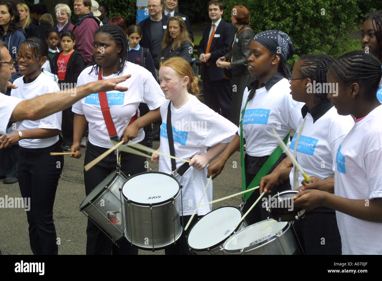 young girls playing drums in school band Stock Photo - Alamy