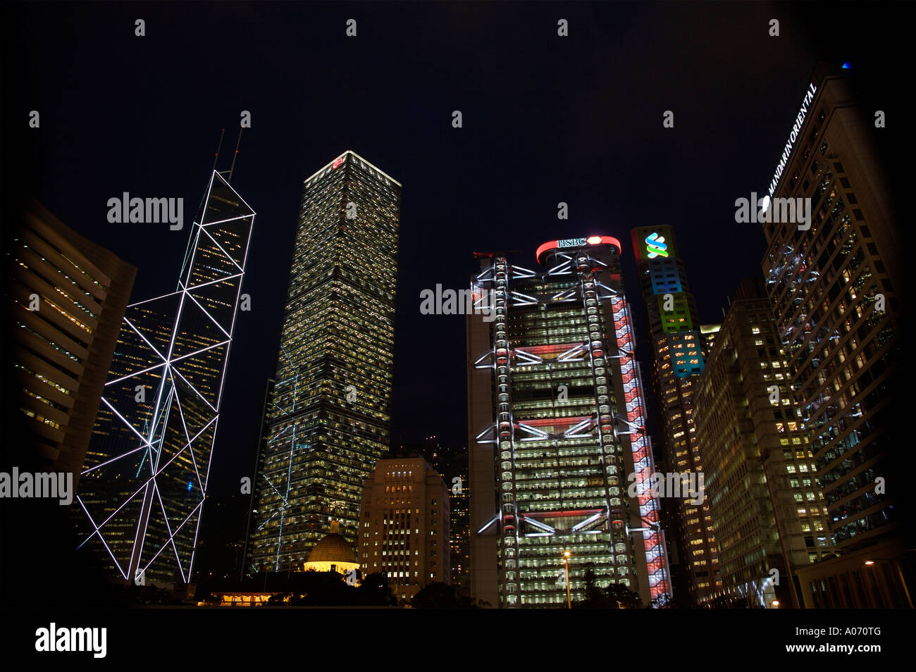 hong kong central district skyline at night illuminated by building ...