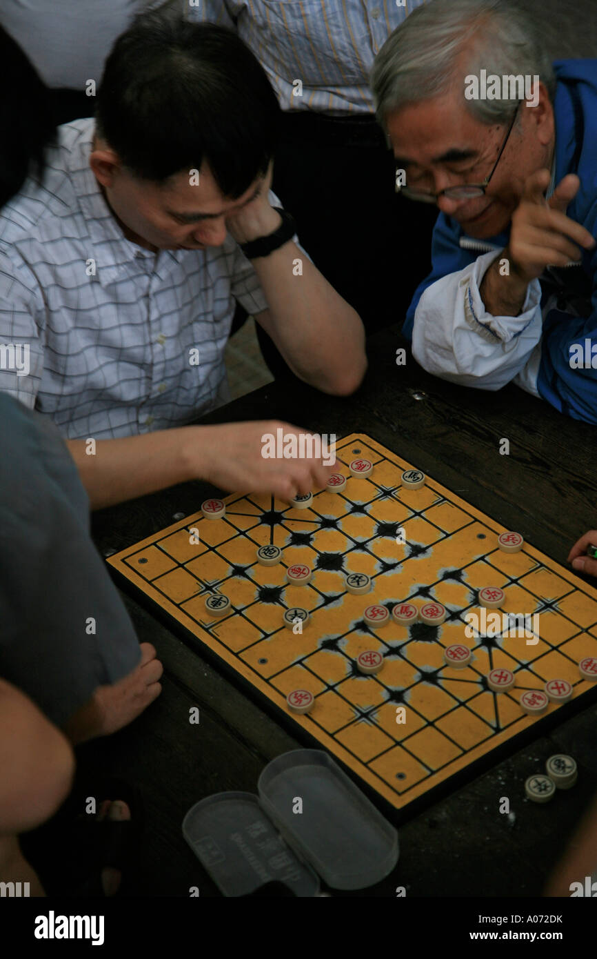 streetscene of chinese men playing chinese chequers in hong kong ...
