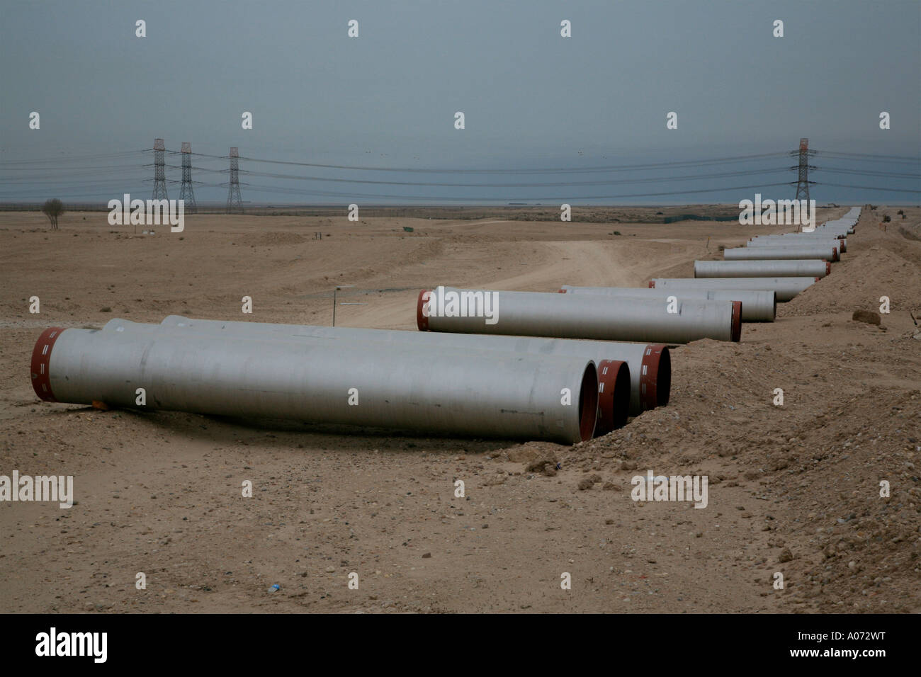 Industrial oil pipes ready to put in ground and connected together in ...