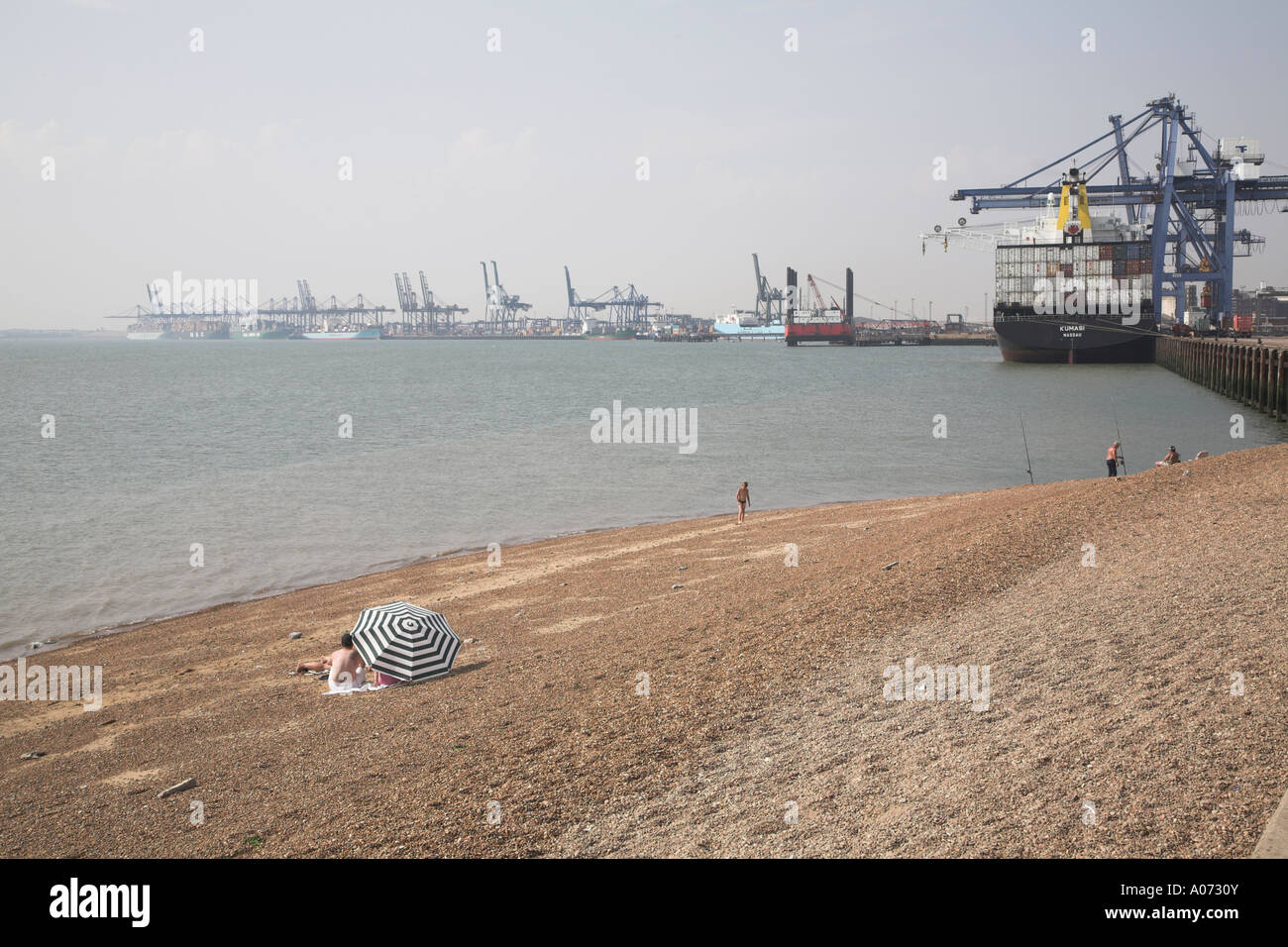Container ship and cranes Port of Felixstowe docks, Suffolk, England ...
