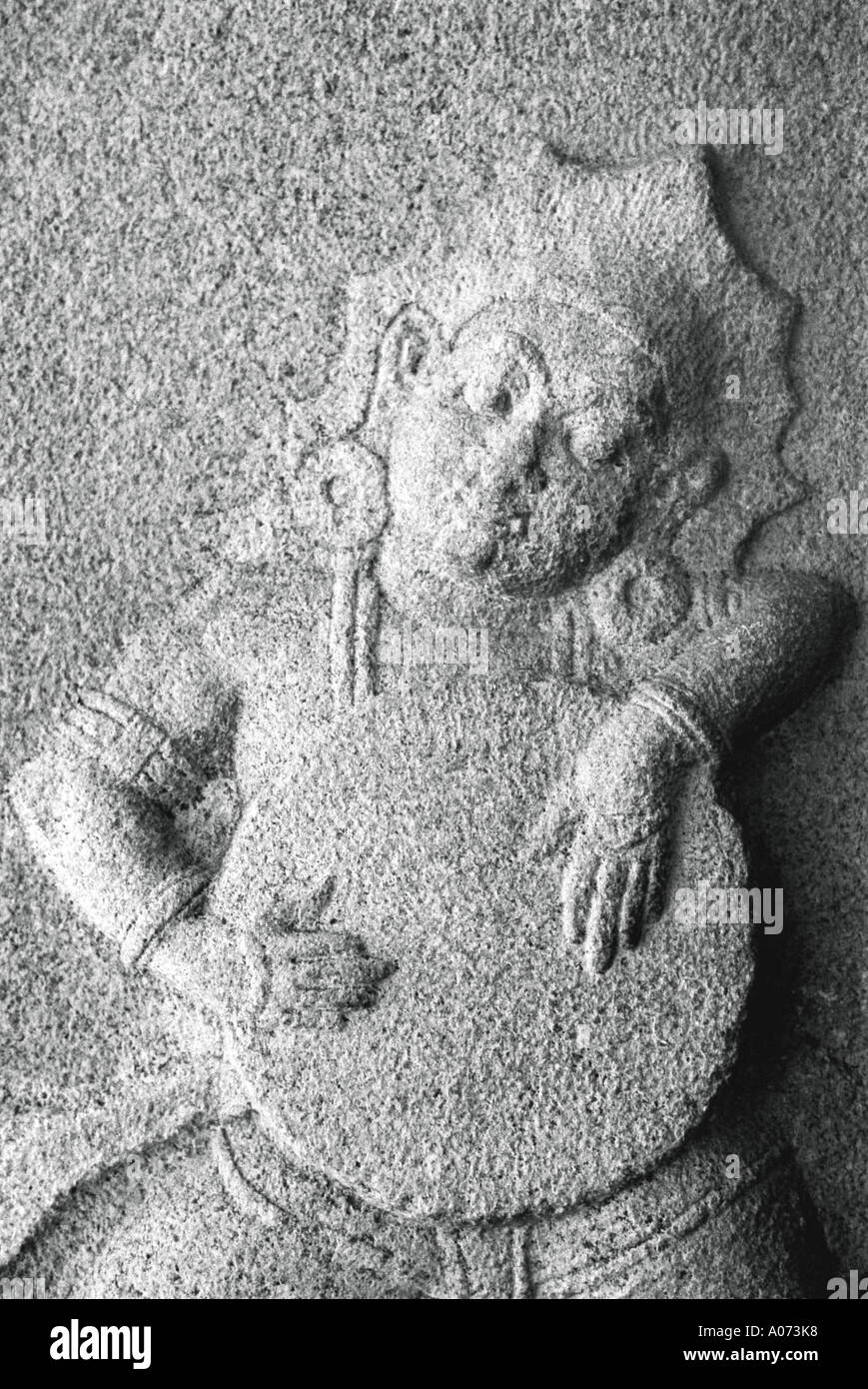 Musician sculpture playing dapli in Hampi Karnataka India Stock Photo ...