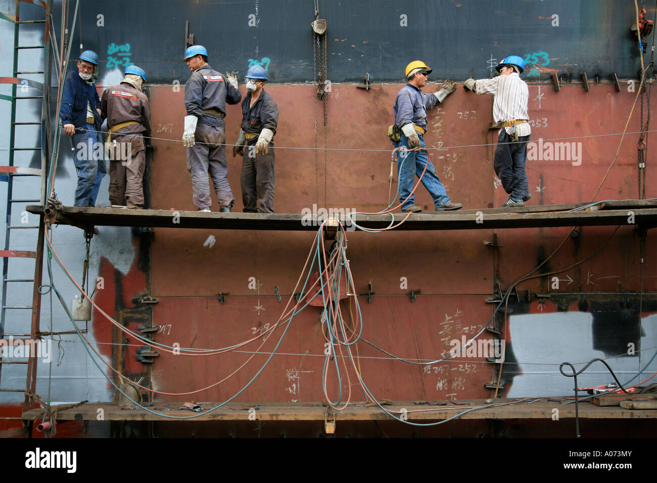 graphic detail shot of ship welder and ship welding painting protective ...
