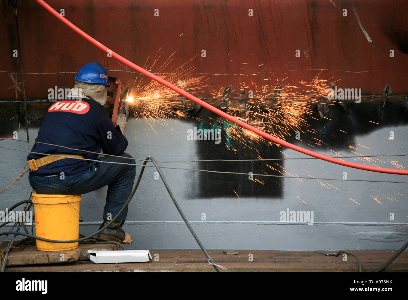 graphic detail shot of ship welder and ship welding painting protective ...
