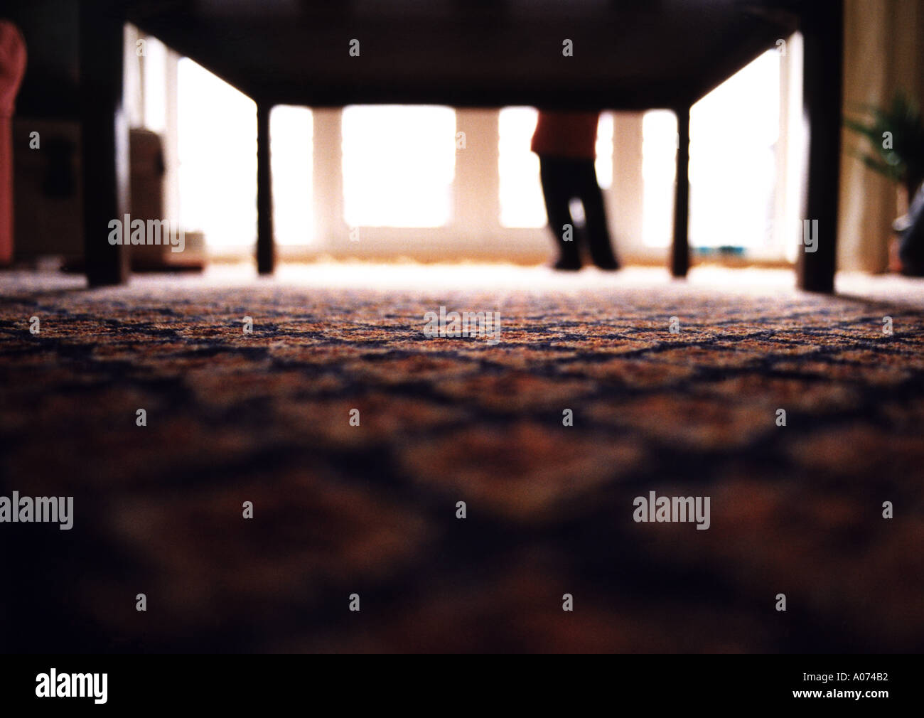 Underneath table hi-res stock photography and images - Alamy