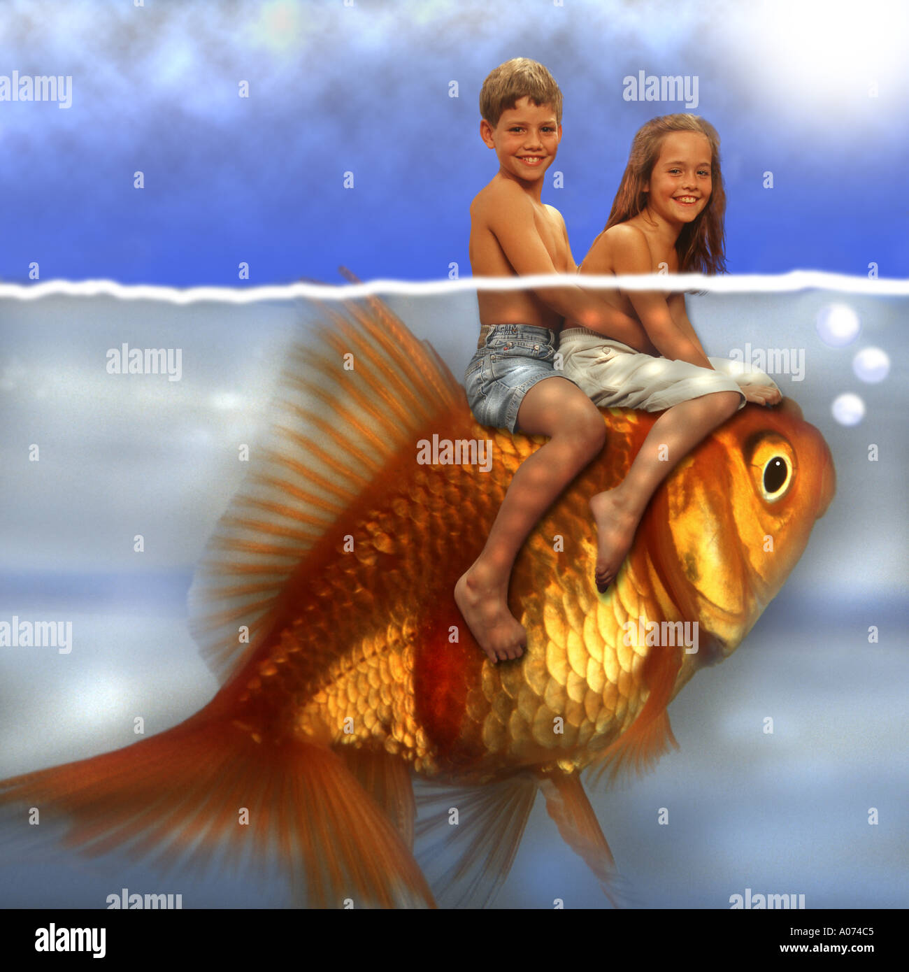 kids on fish travelling Stock Photo - Alamy