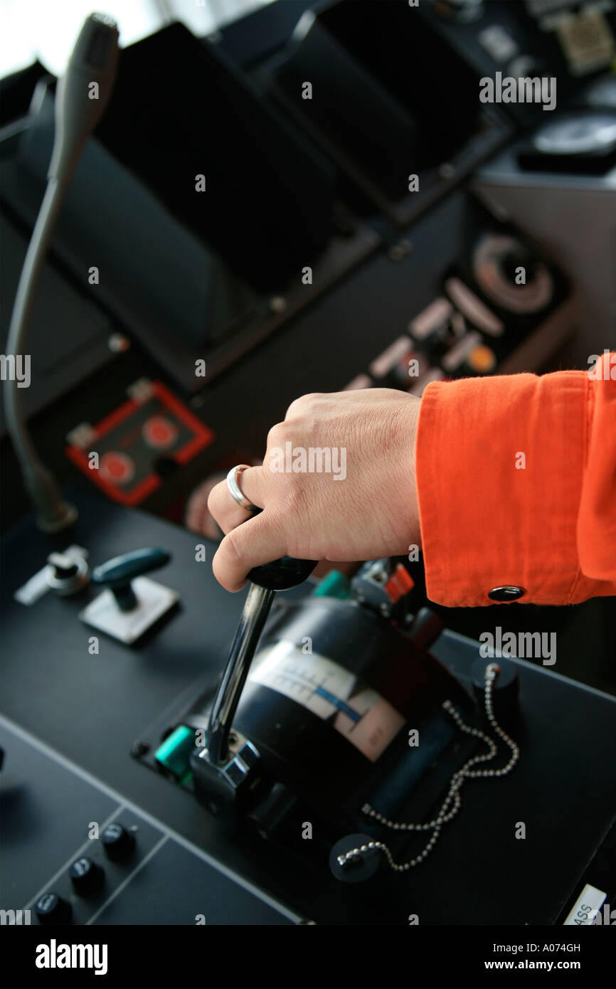 Graphic shot of Tugboat captain using controls whilst manoevering by ...