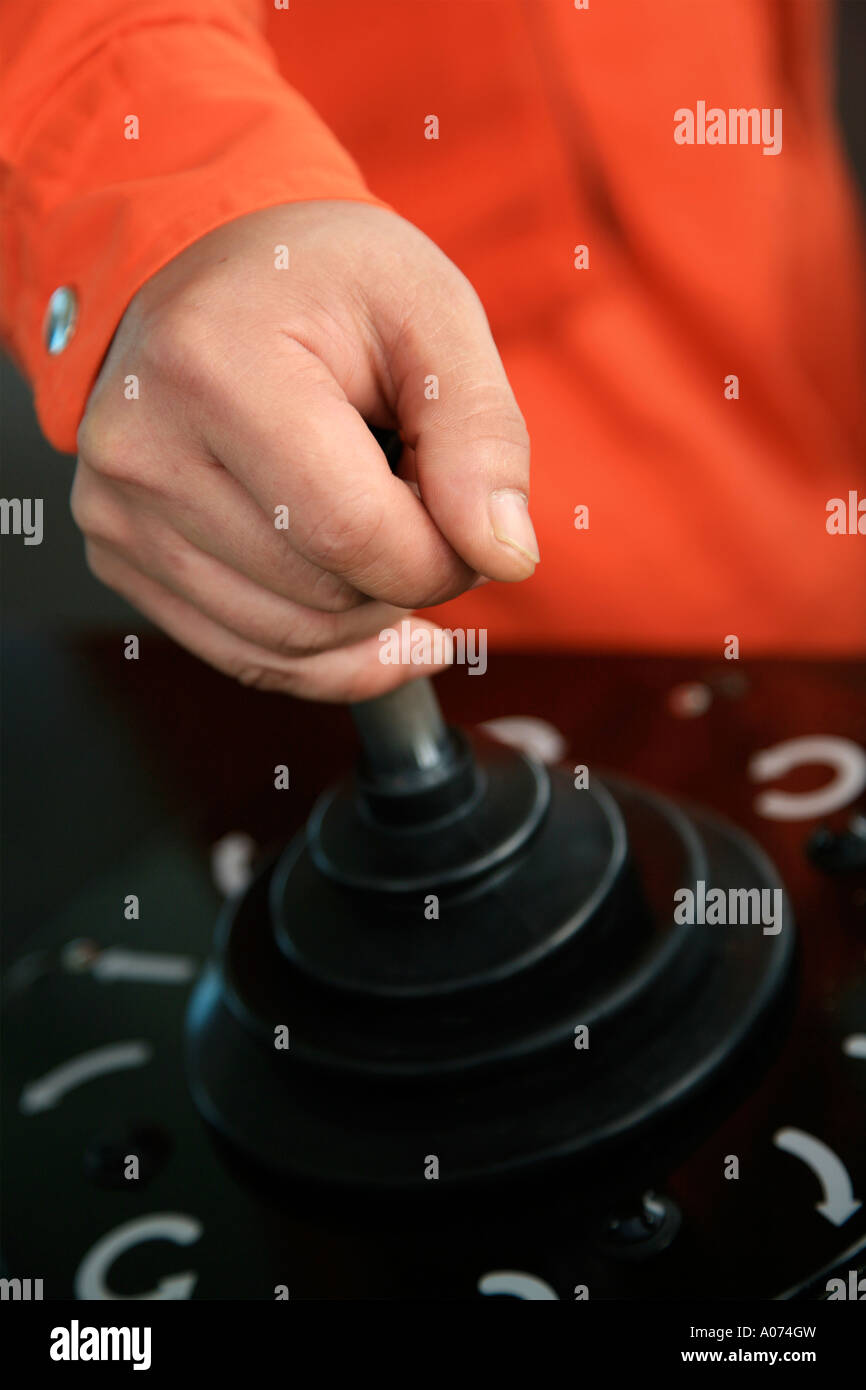 Graphic shot of Tugboat captain using controls whilst manoevering by ...
