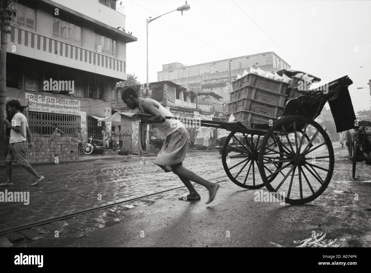 Rickshaw puller Calcutta Kolkata West Bengal India Stock Photo - Alamy