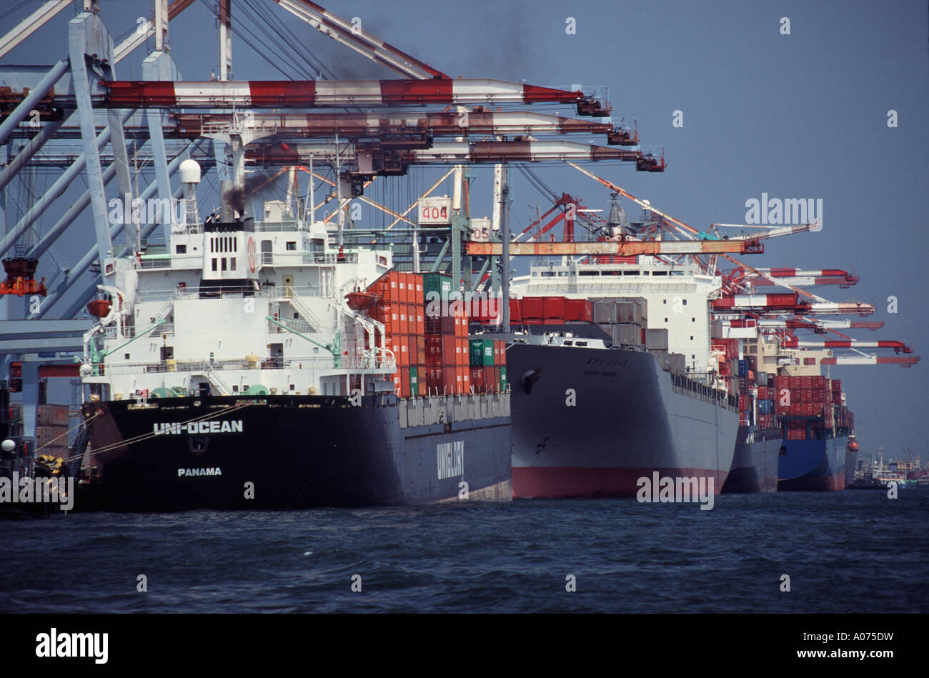 Khaosiung container port with ships lined up quayside in taiwan fareast ...