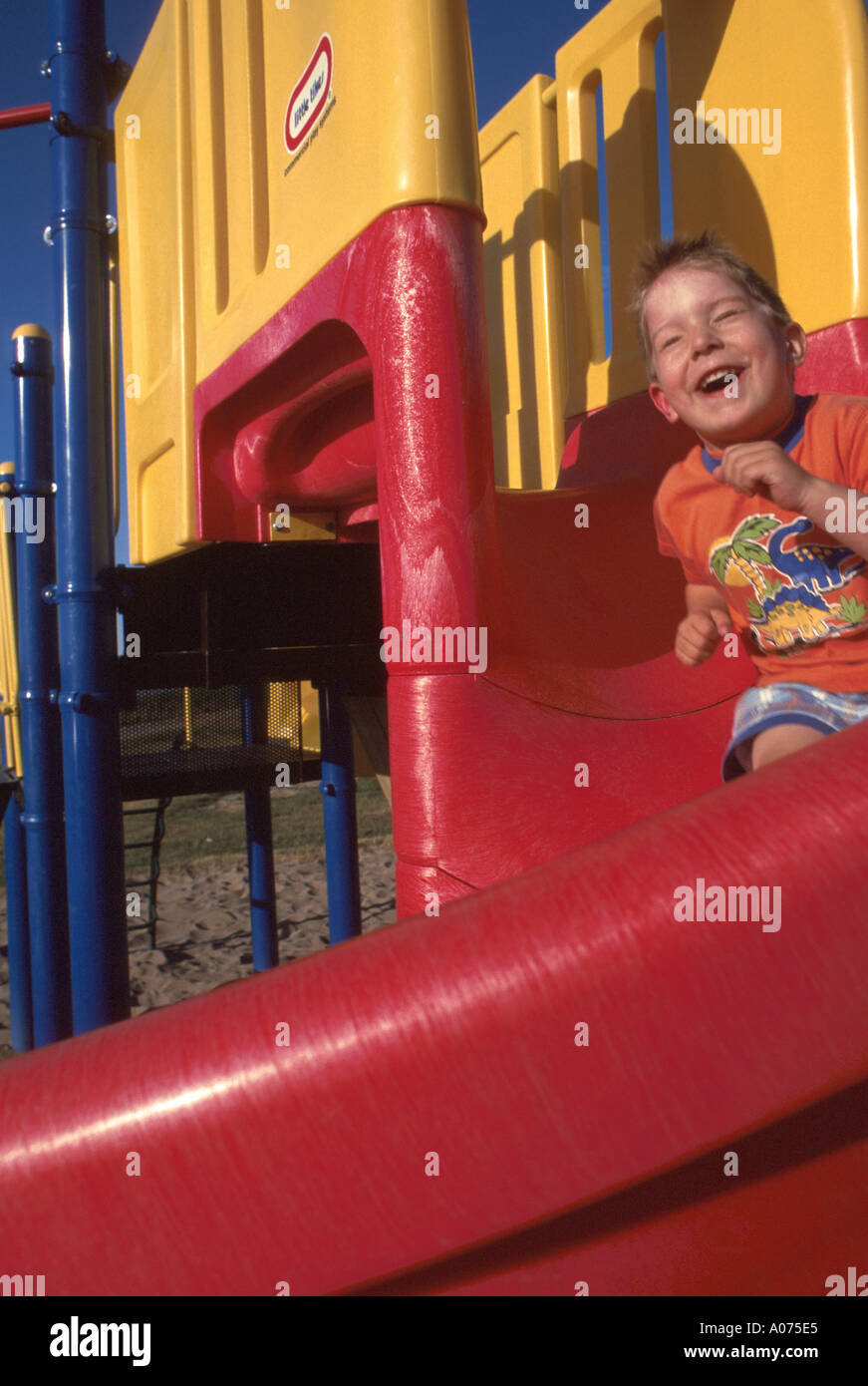 child on slide Canada Stock Photo - Alamy