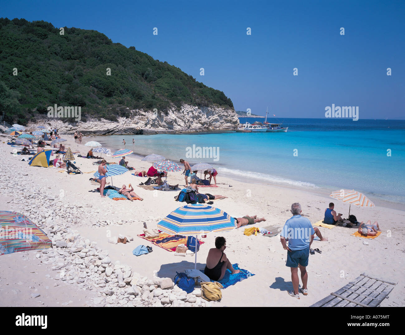 Vrika Beach Anti-Paxos Island Greece with Holidaymakers Stock Photo - Alamy