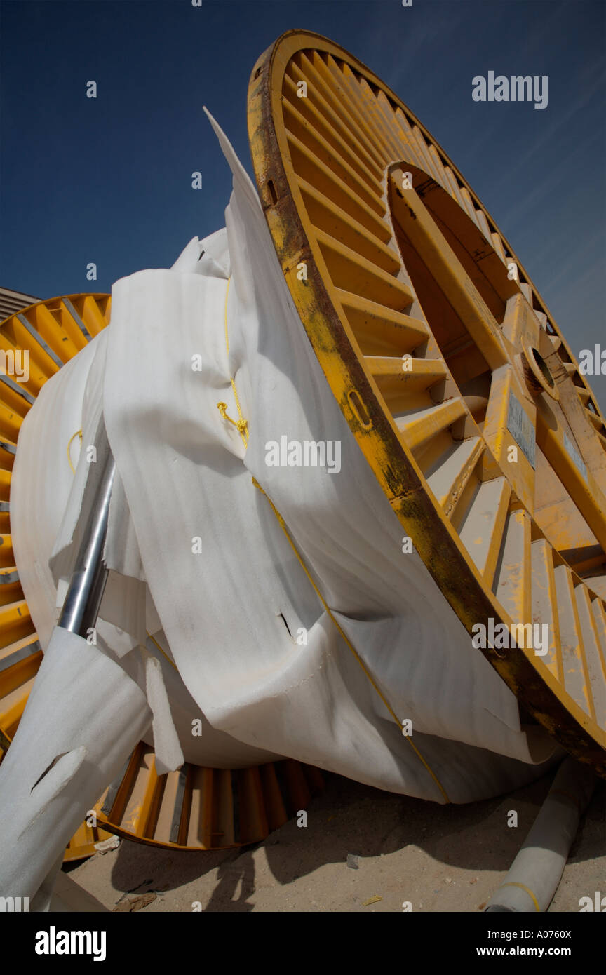 Graphic shot of large electricity power cable spools in dubai uae ...