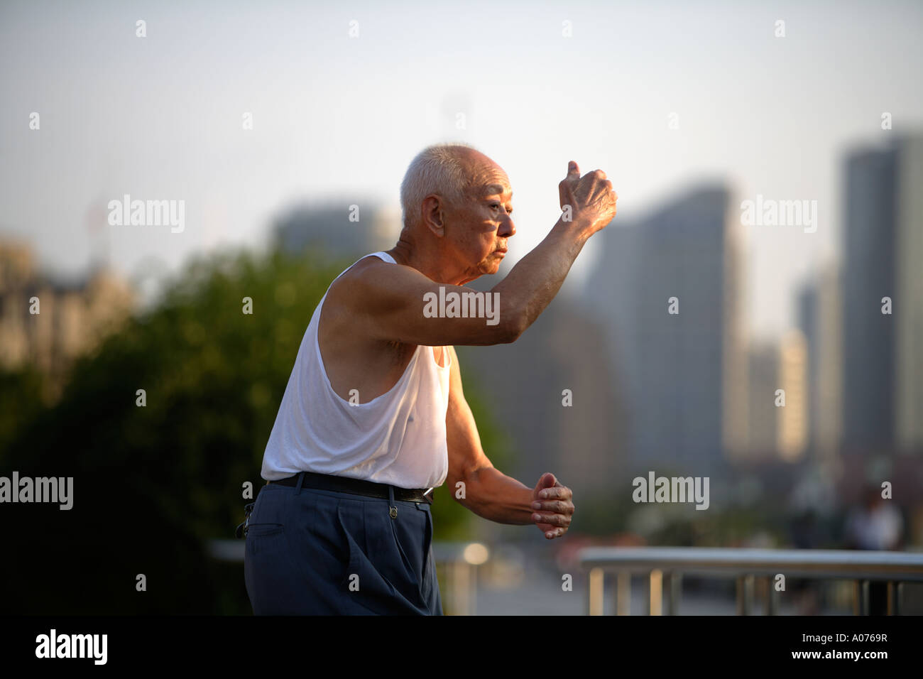 Old man doing tai chi hi-res stock photography and images - Alamy