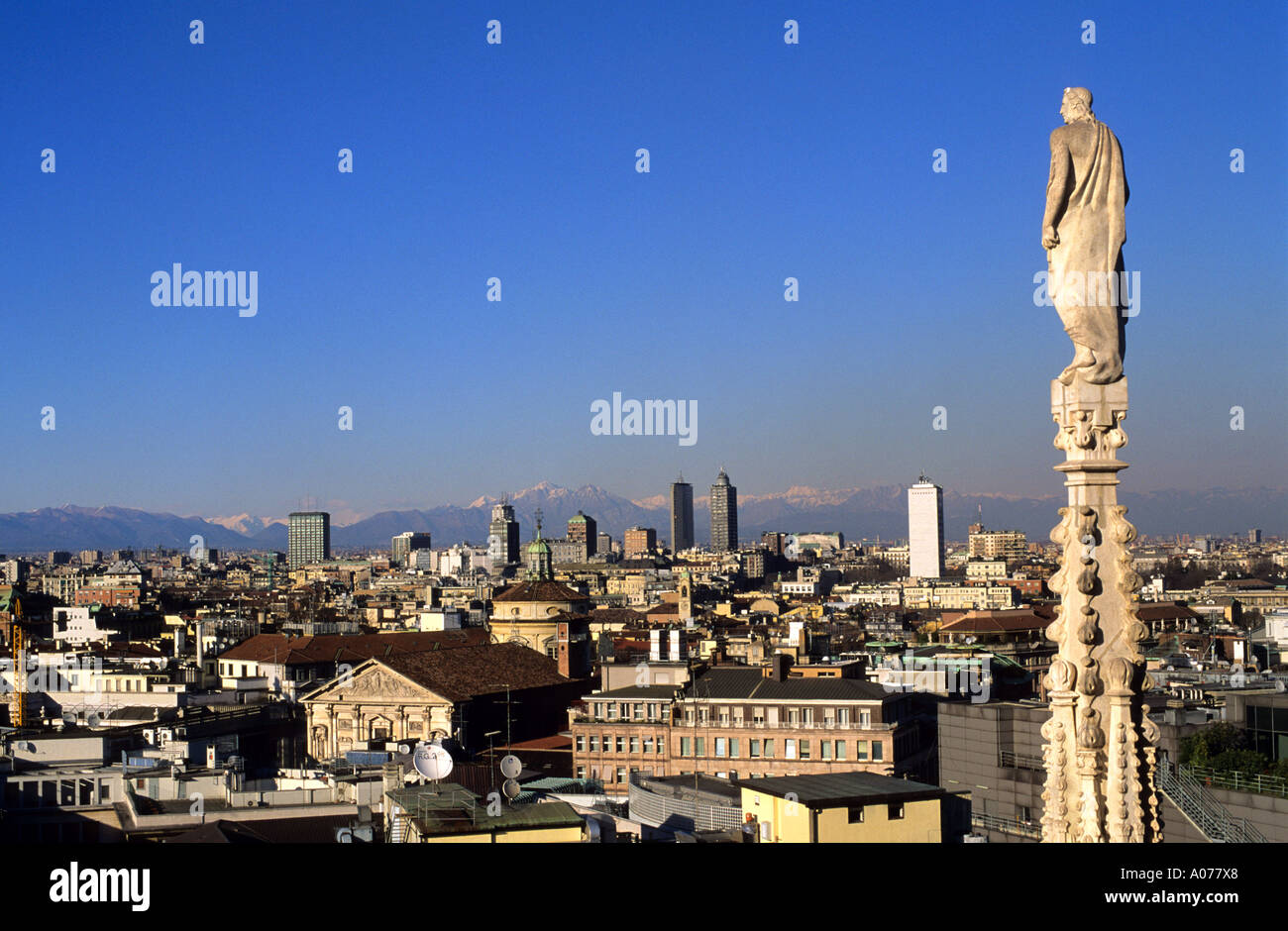 Modern buildings contrast with old buildings in Milan, Italy. Italian ...