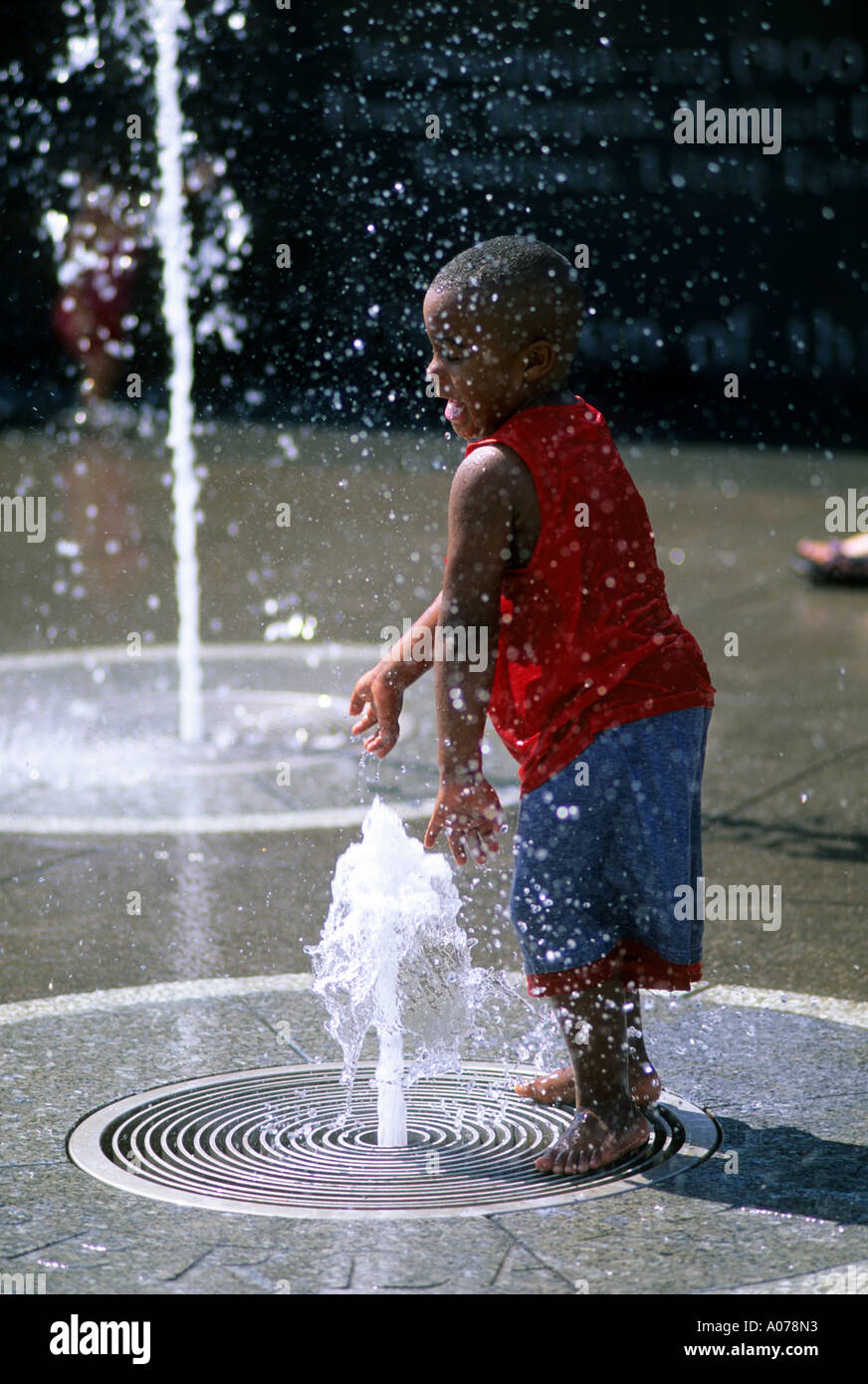 African american boy water fountain hi-res stock photography and images ...