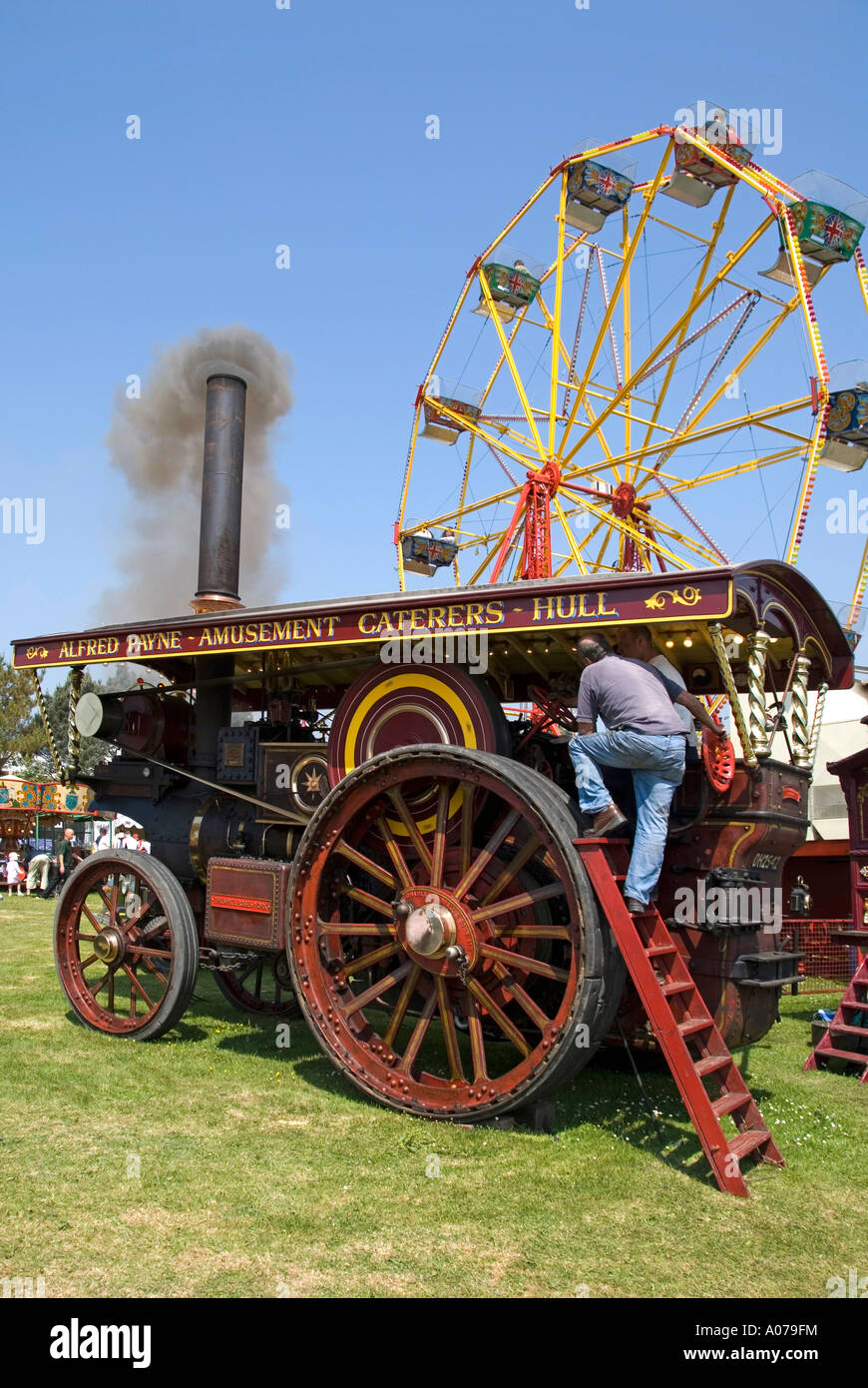 Royal Cornwall Show country event man on working steam traction engine ...