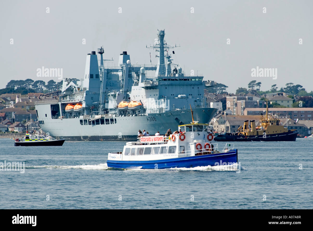 RFA Fleet Replenishment ship Fort George passing dockyard & warships ...