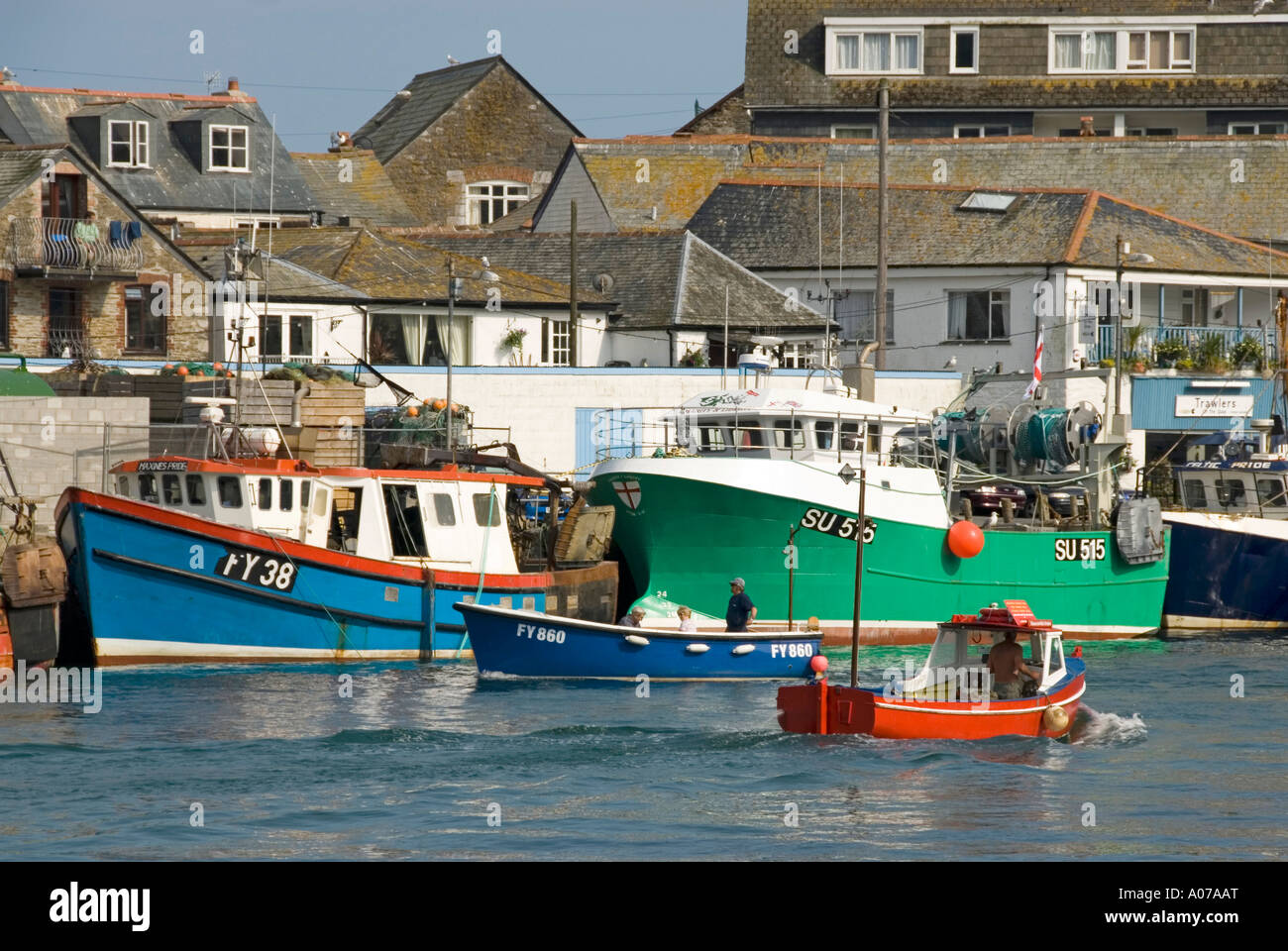 Touristy East Looe Cornish coastal town & fishing port boats moored at ...
