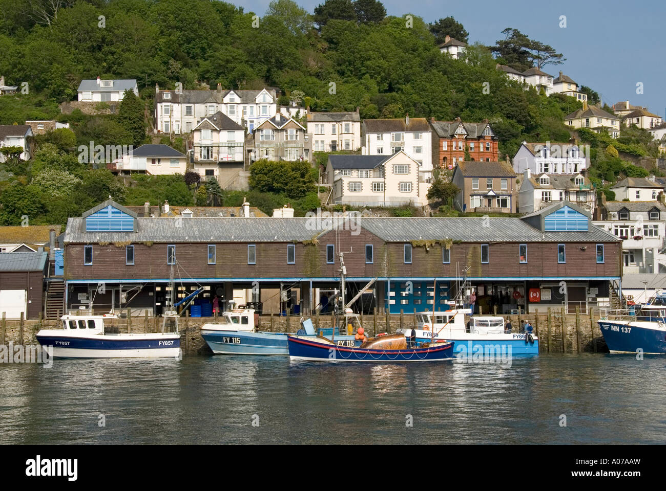 port of Looe and the fish market building on the quayside Stock Photo ...