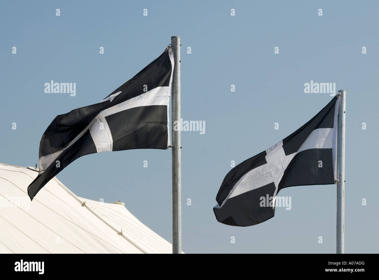 Flag of St Piran patron saint of miners flying above marquee Stock ...