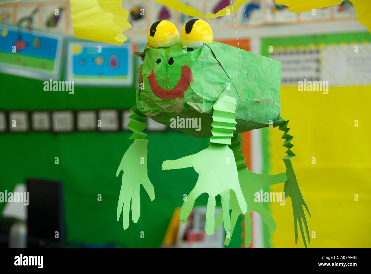 A paper and cardboard frog made in a children's school art class Stock ...