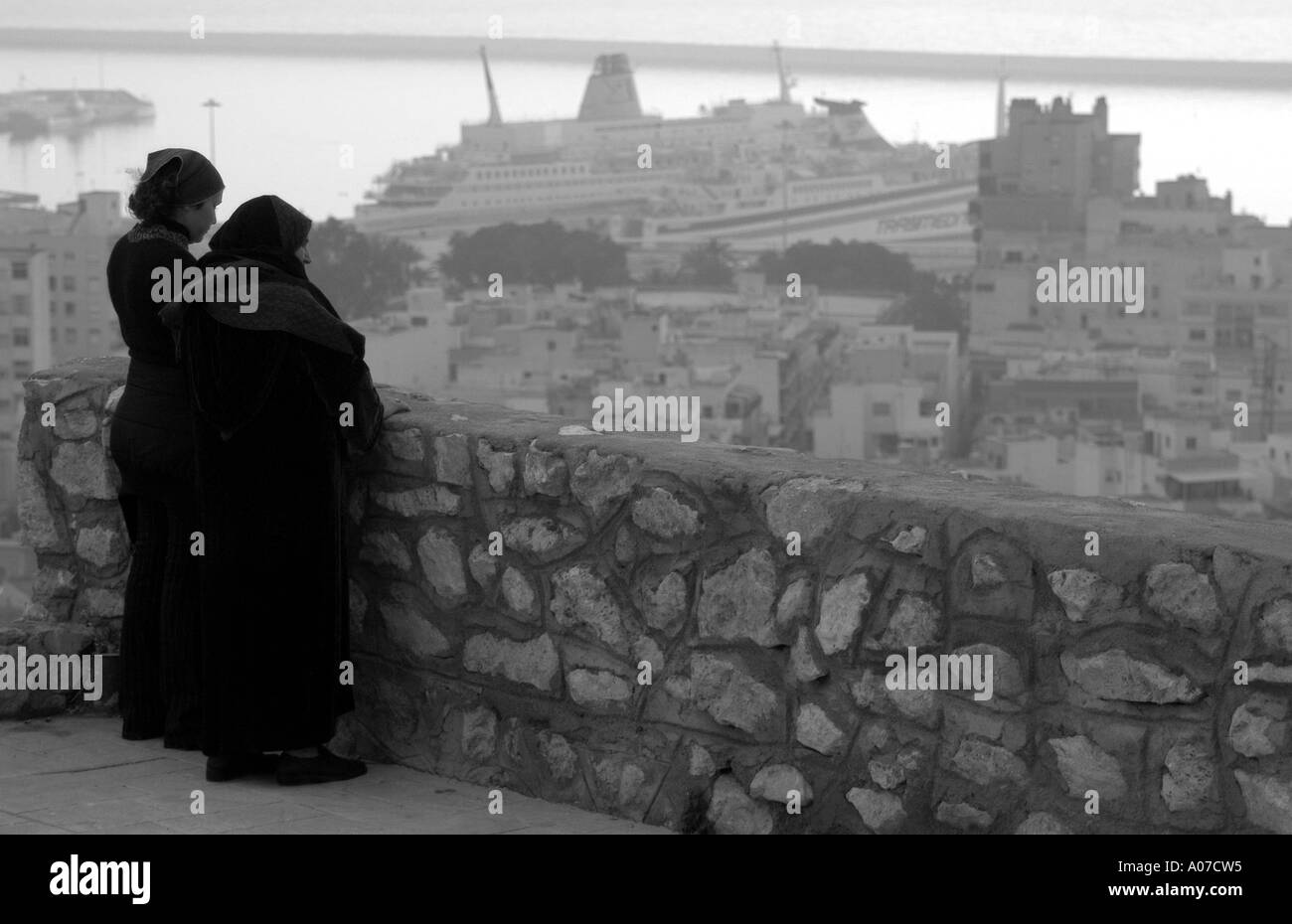 Moroccan Mother, Daughter, and Ship, Almeria, Southern Spain Stock ...