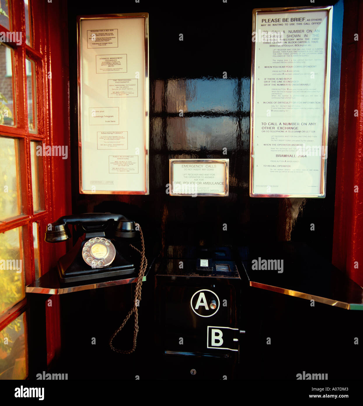 Communication interior of phone box Stock Photo - Alamy