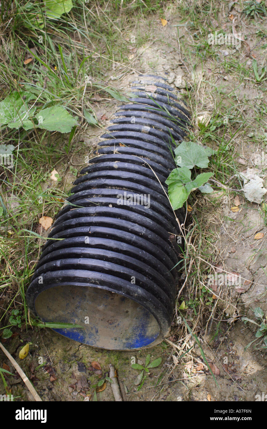 Drainage pipe into ditch, UK Stock Photo - Alamy