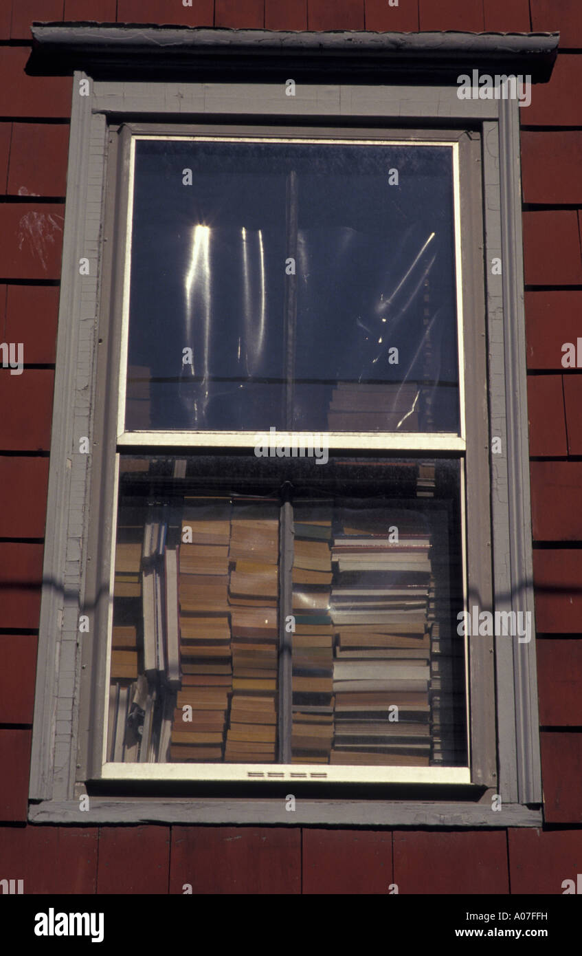Window blocked with piles of books Stock Photo - Alamy