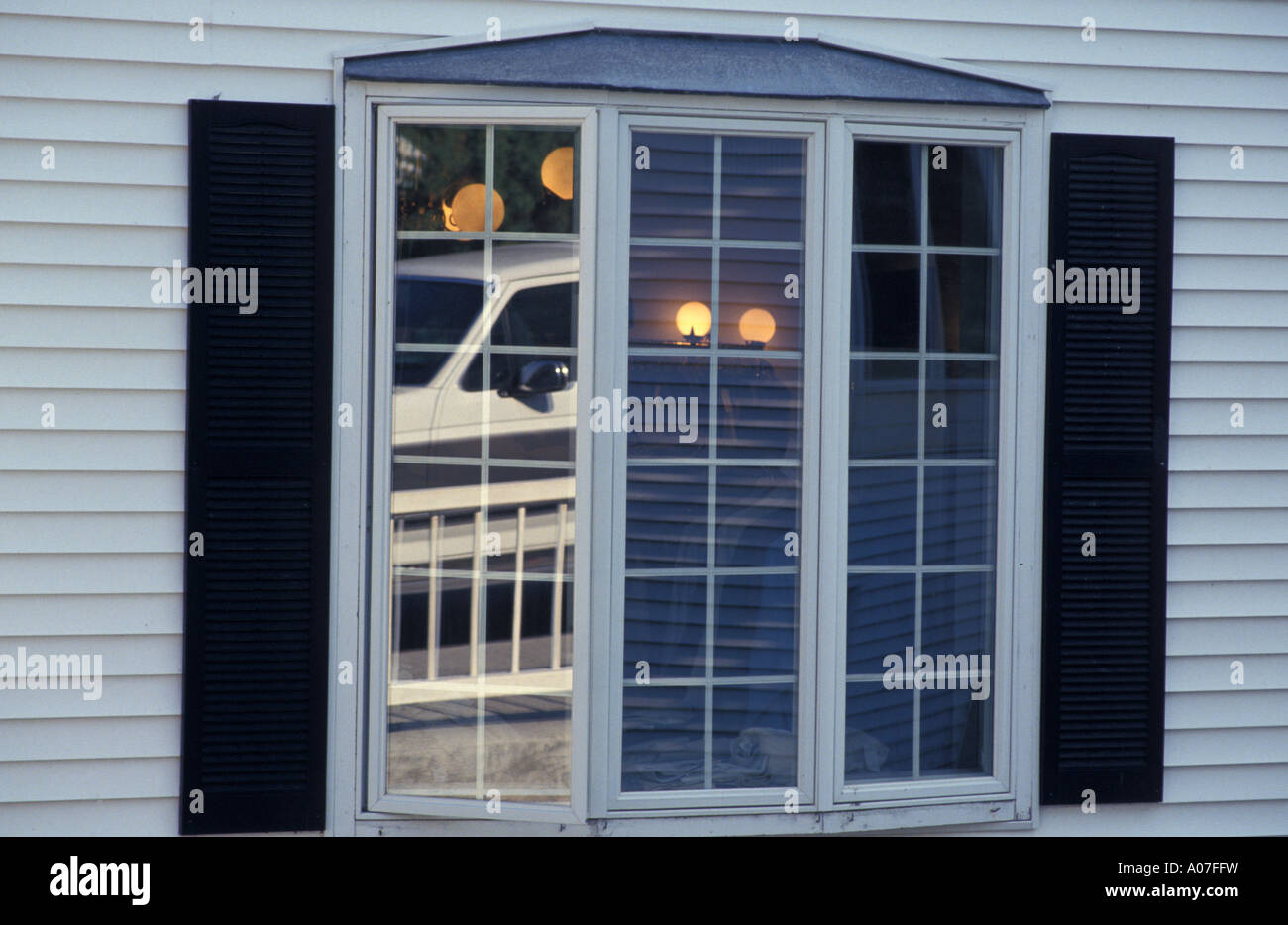Closed window reflection from street scene USA Stock Photo - Alamy